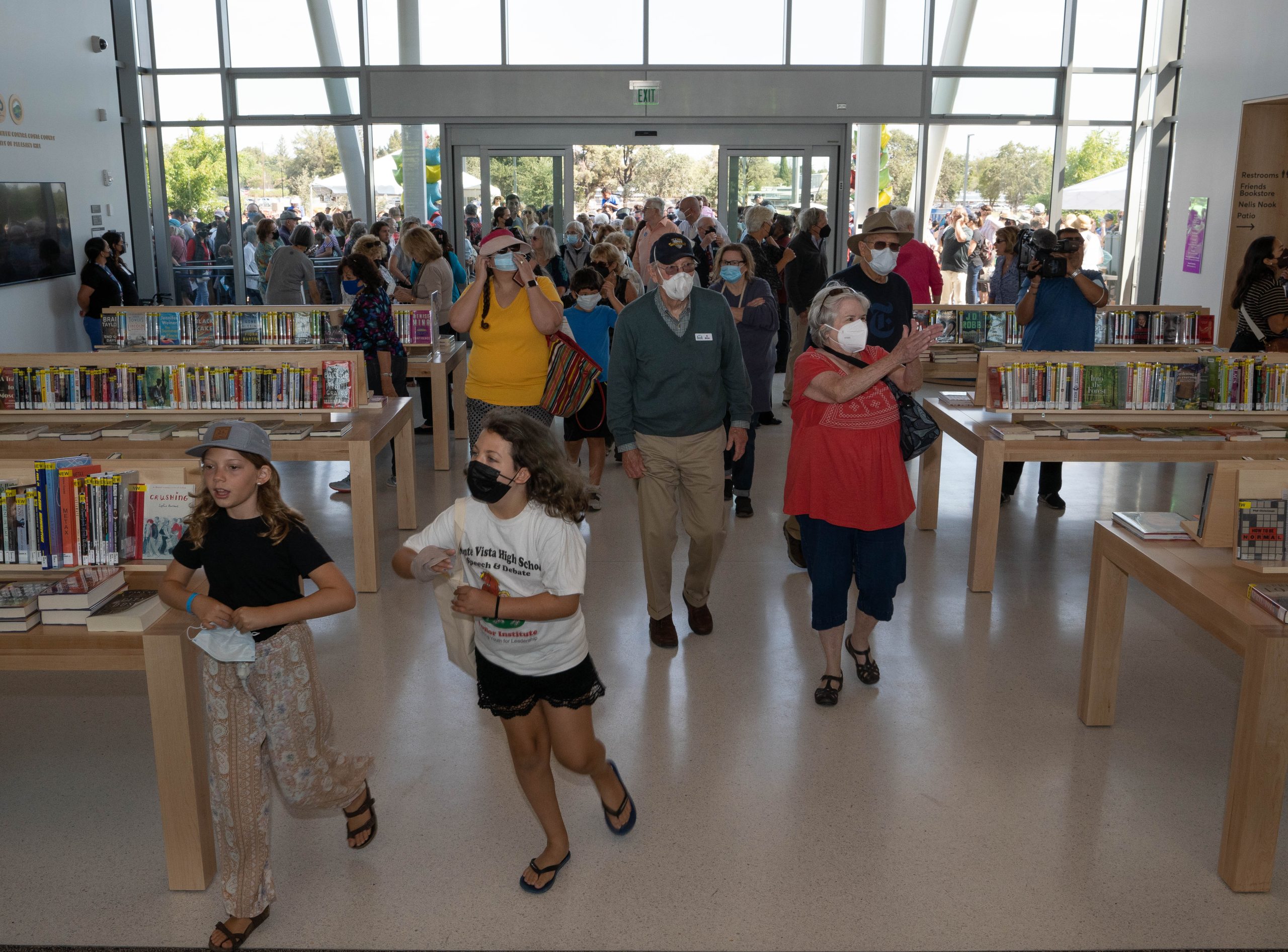 Writing the next chapter: Thousands turn out on opening day of new ...