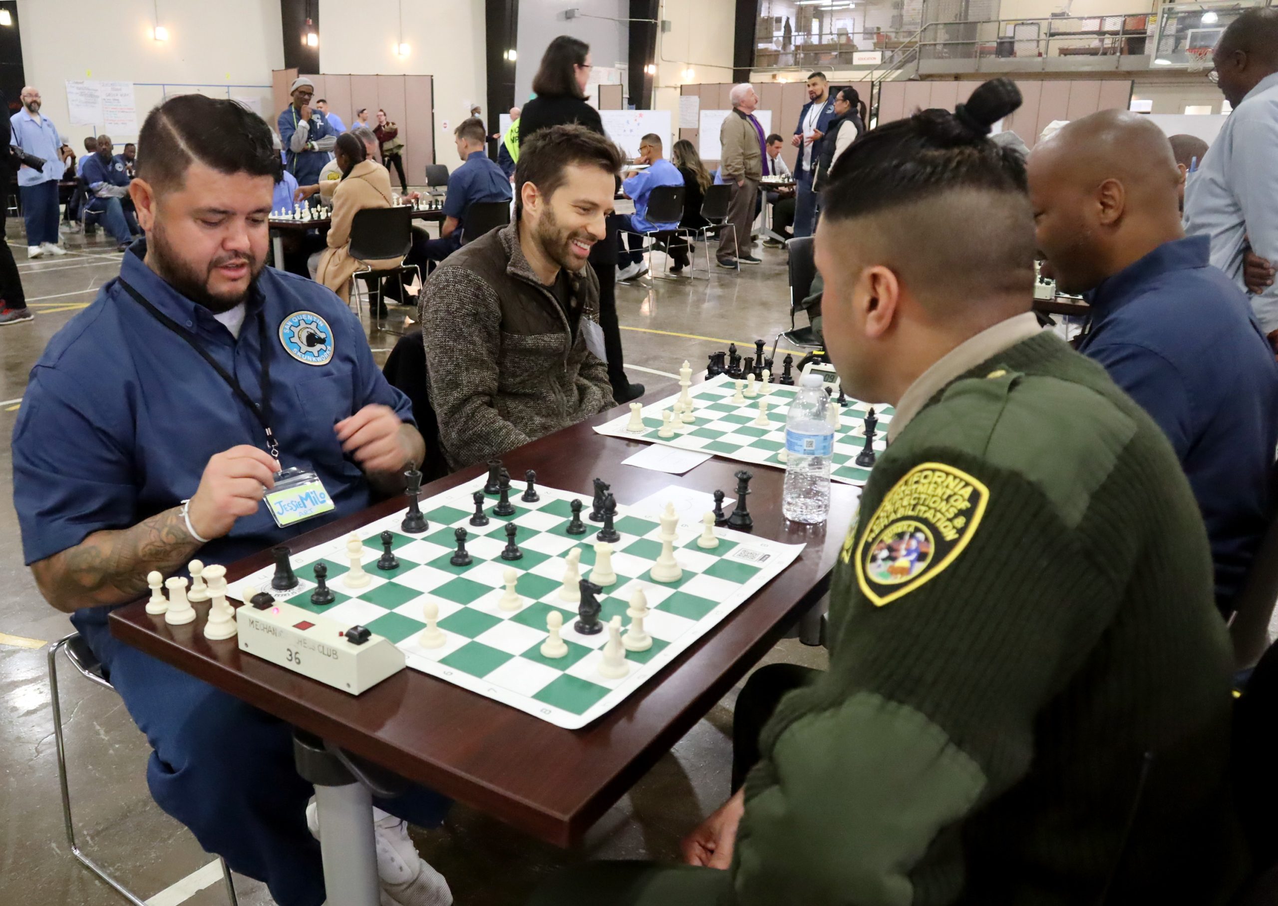 Pawns to progress: San Quentin chess event unites prisoners, guards to ...
