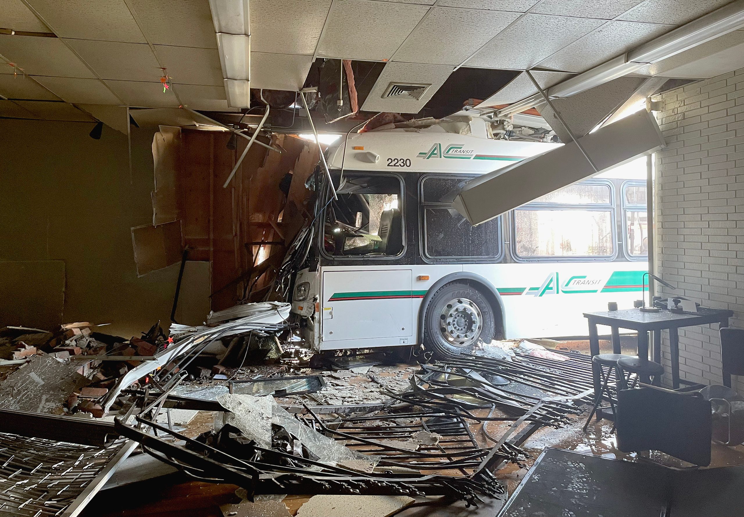 11 people injured when AC Transit bus crashed into auto body shop ...